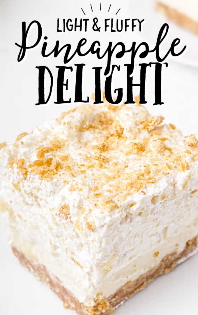 This pineapple delight features a buttery graham cracker crust, a laye ...